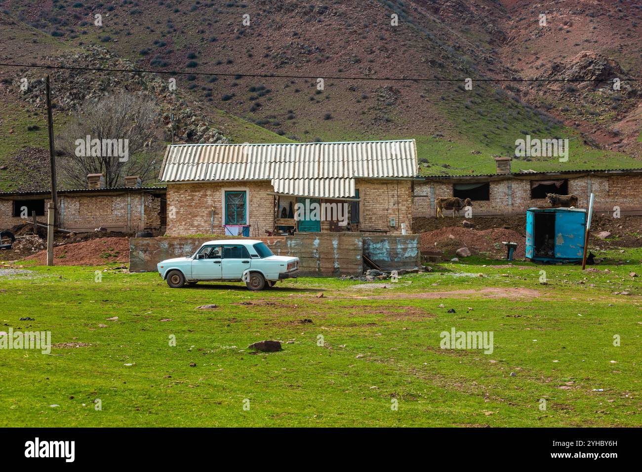 old white car in front of rustic farm house in Kyrgyzstan Stock Photo ...