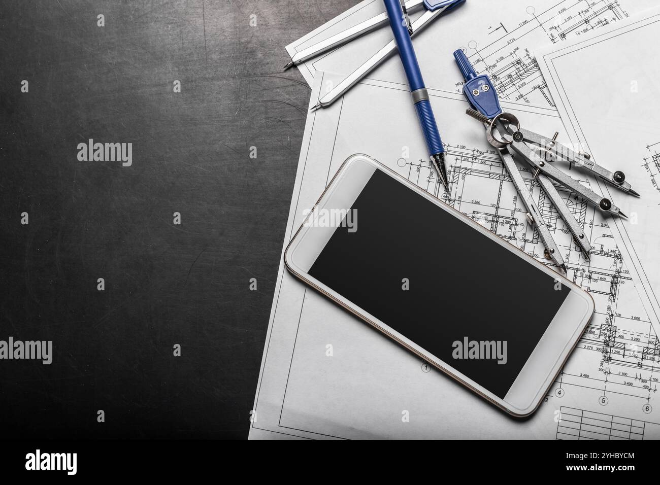 Construction planning drawings on black background Stock Photo - Alamy