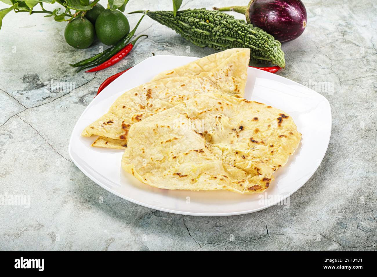 Indian cuisine tandori bread - naan with cheese Stock Photo - Alamy