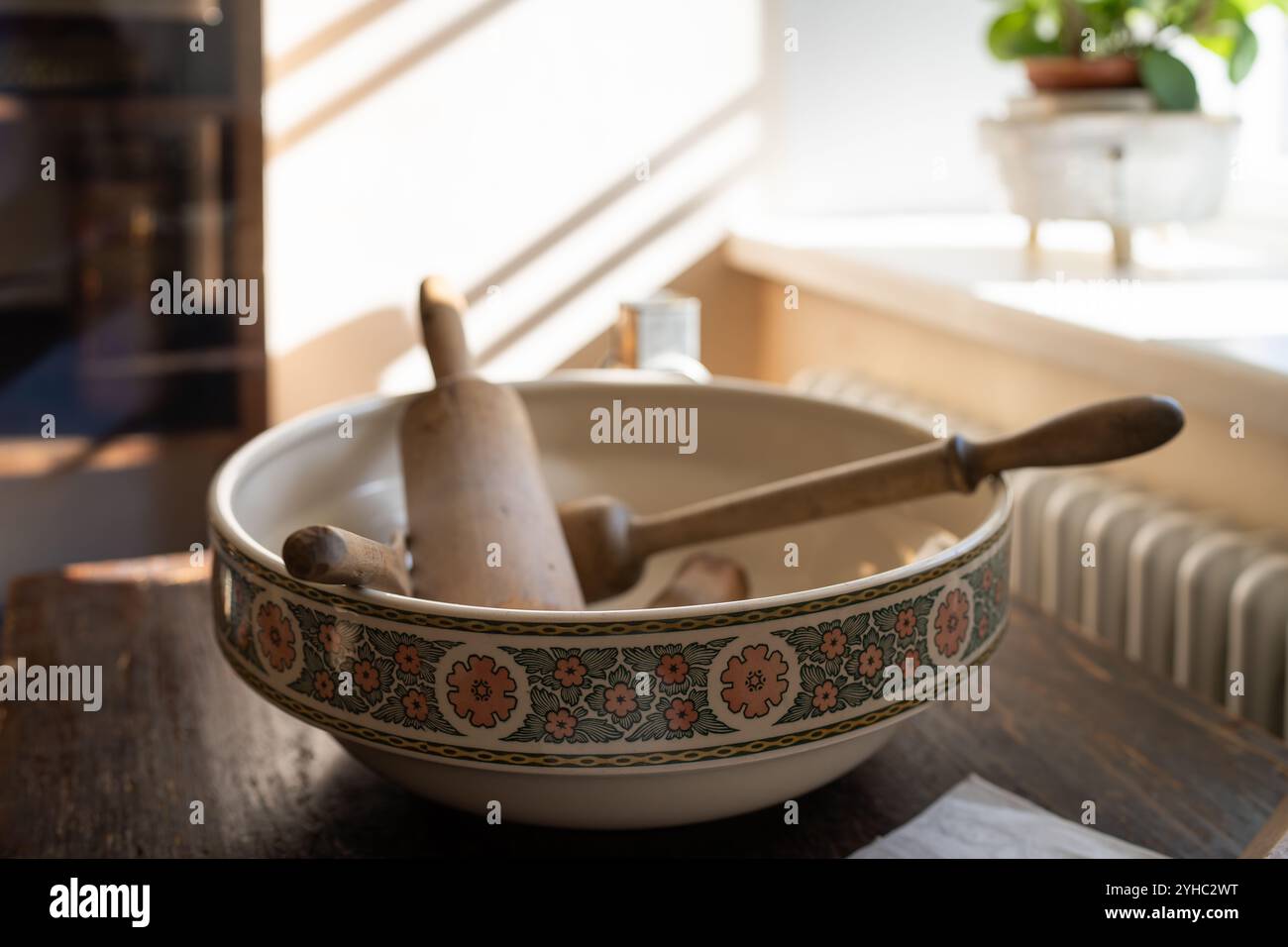 An old-fashioned kitchen interior. Vintage ceramic bowl with kitchen ...