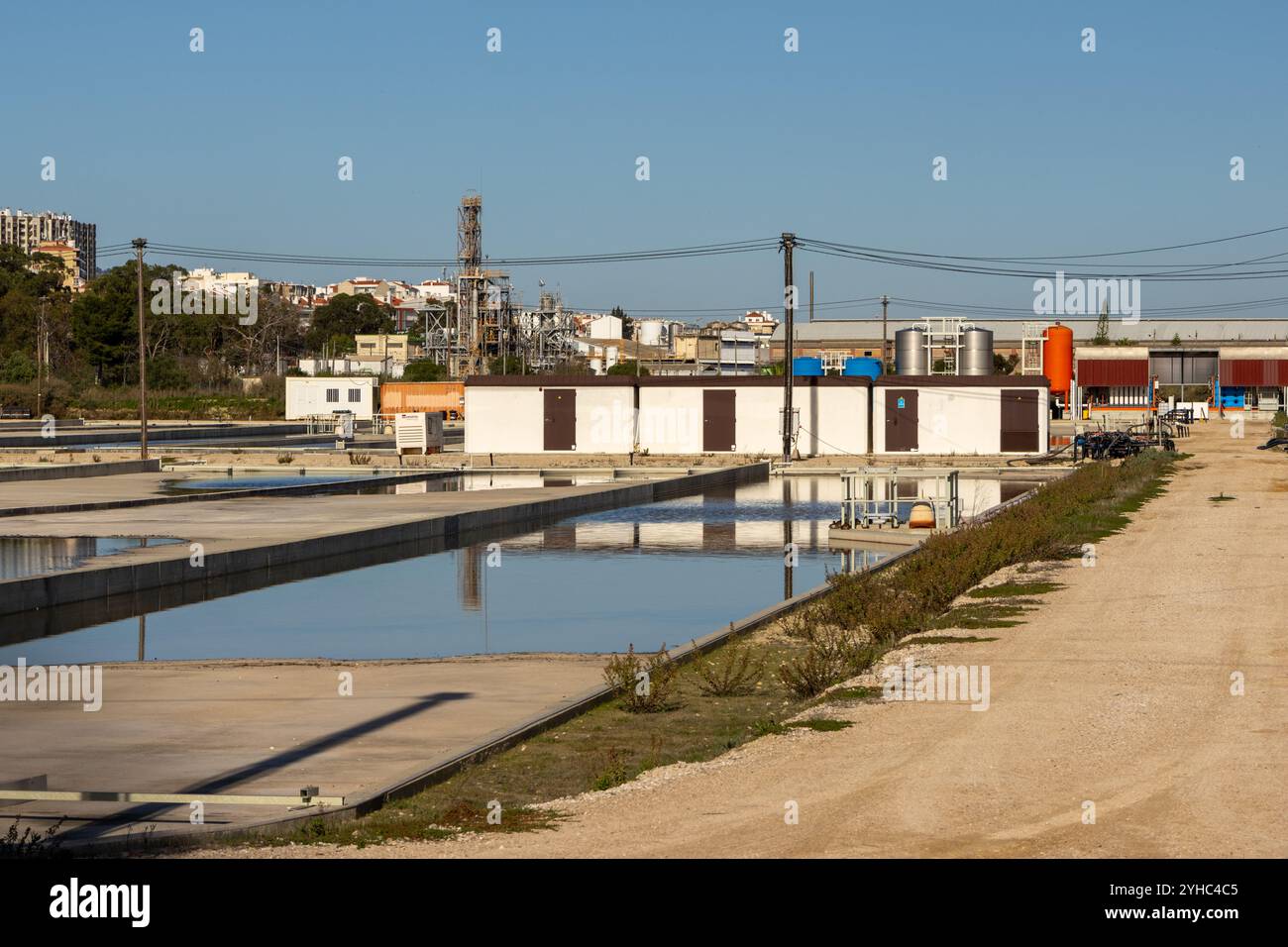 Open air algae farm reflecting in water tanks at algtec eco business ...