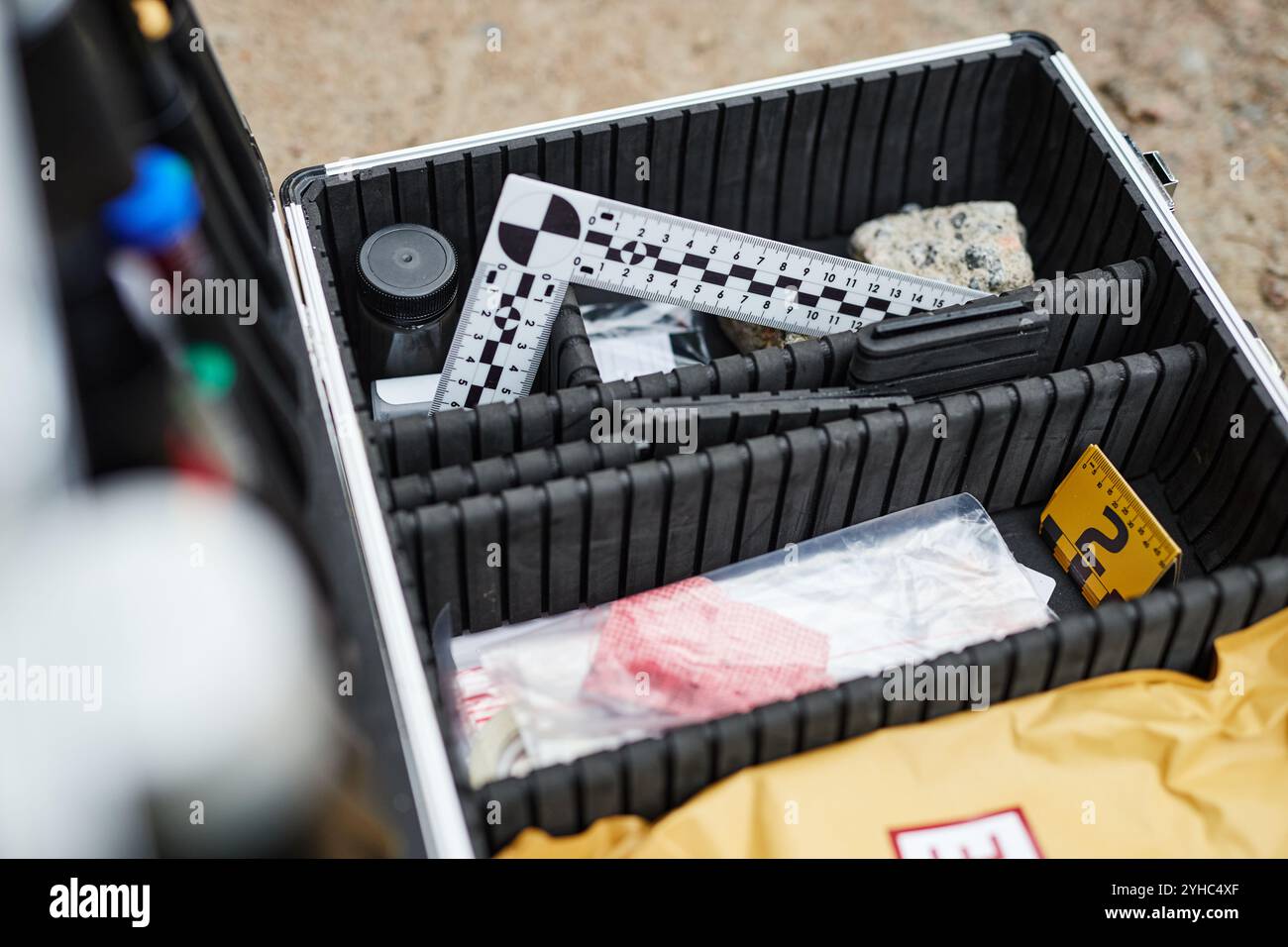 Top view background image of toolkit case and equipment of police and ...