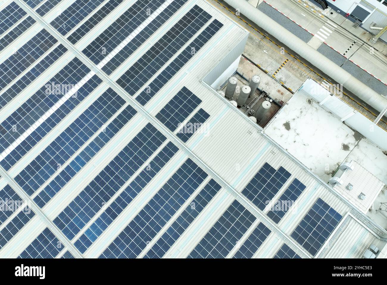 Solar energy for factory and warehouse building. Solar panels on roof ...