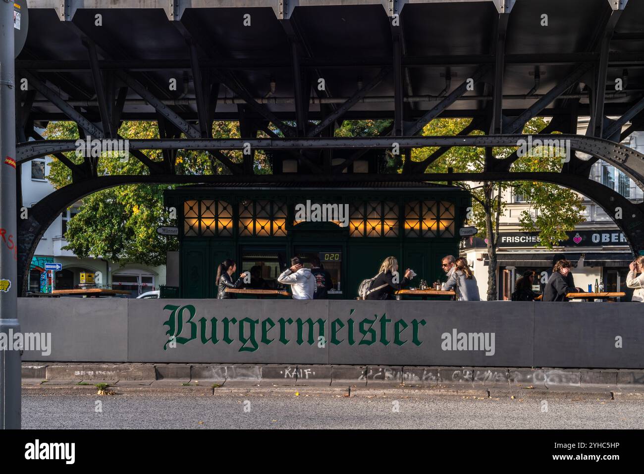 A busy Burgermeister fast food outlet under a U-Bahn bridge in Berlin ...