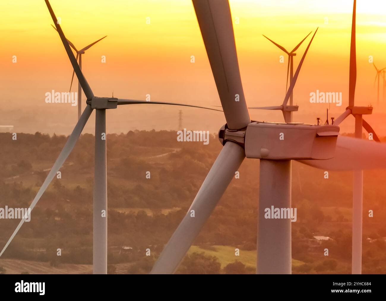 Wind farm field and sunset sky. Wind power. Sustainable, renewable ...
