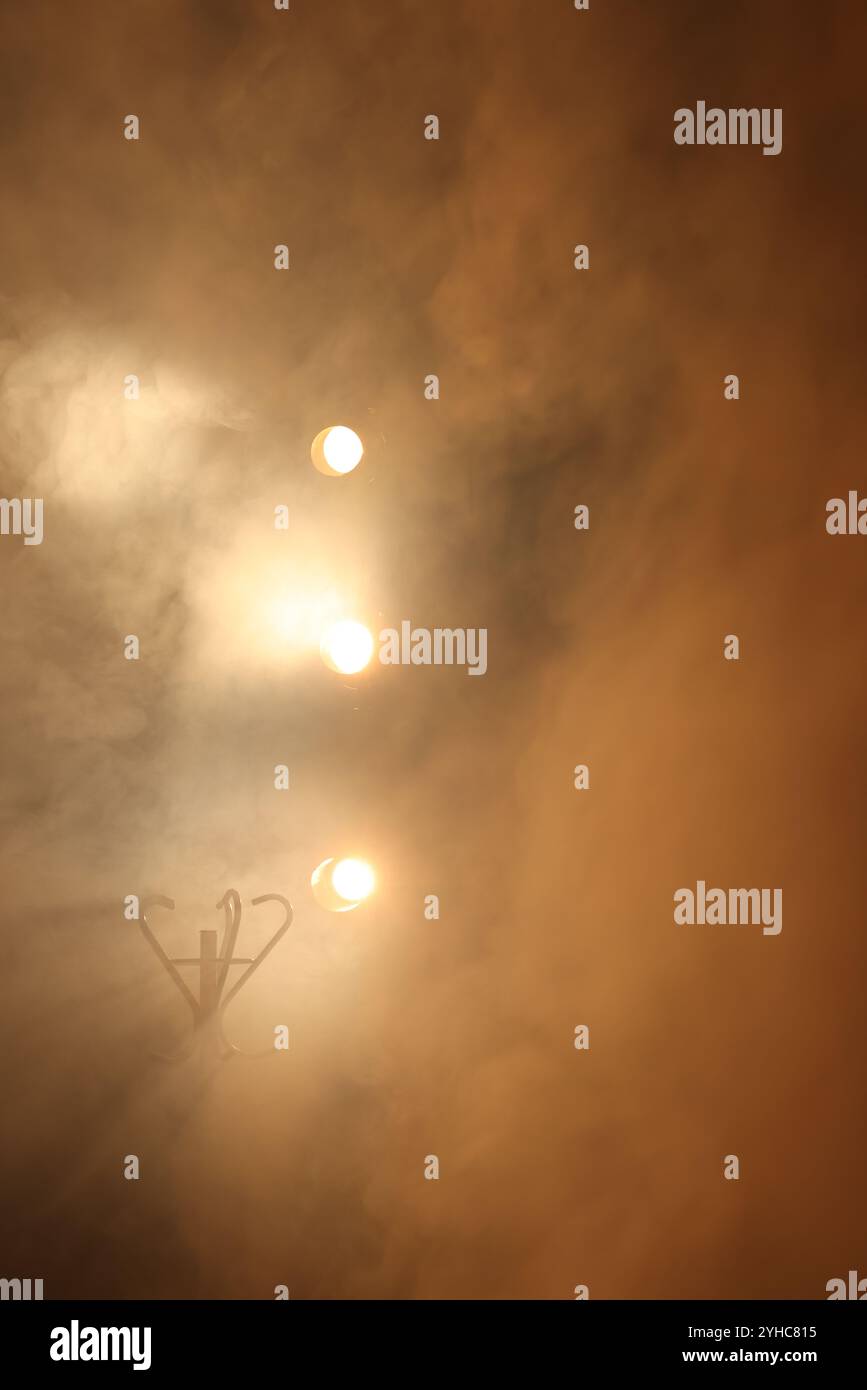 Professional spotlights and smoke on stage in theatre Stock Photo - Alamy