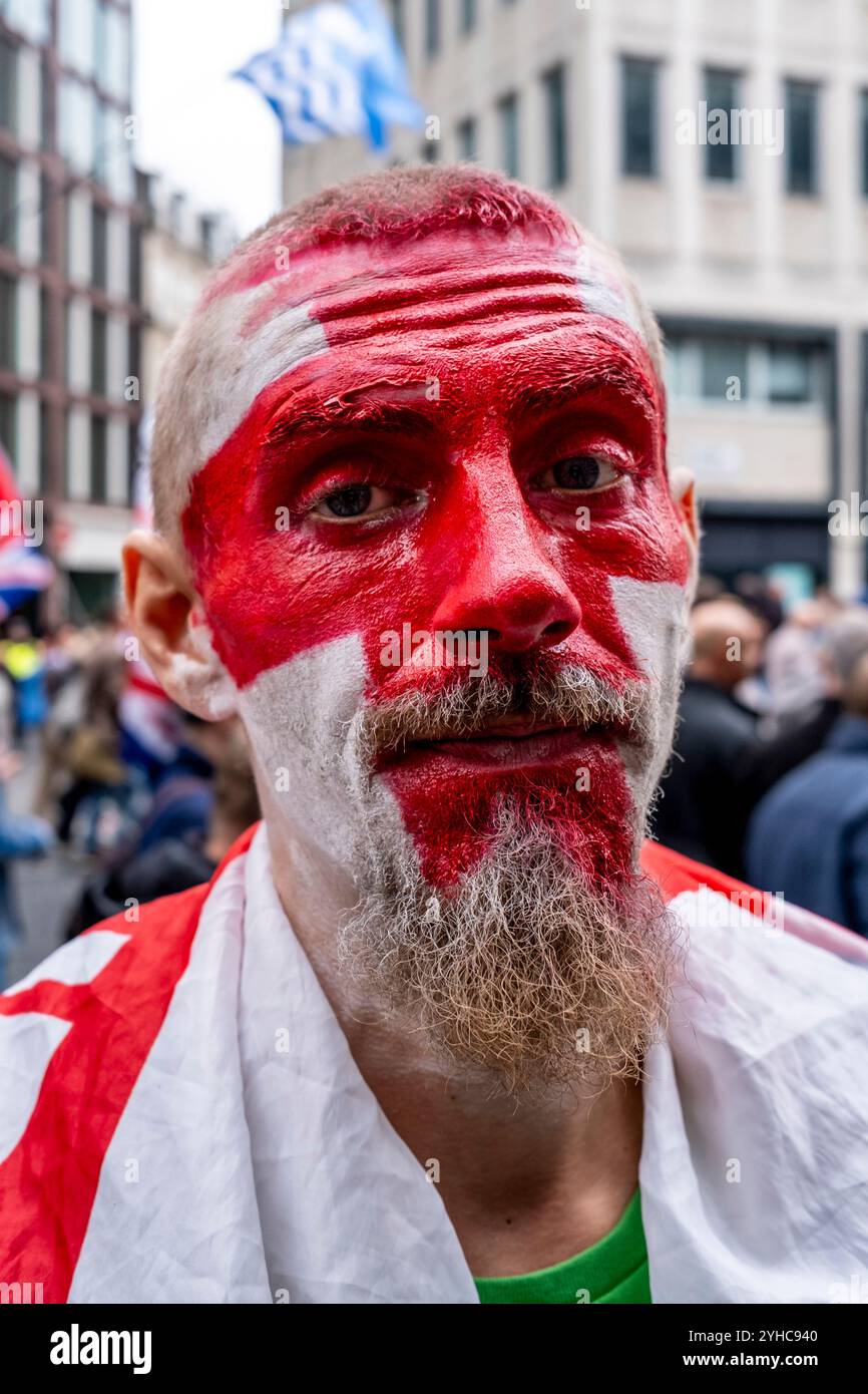 A Man With A Cross of St George Face Painting Takes Part In The Unite ...