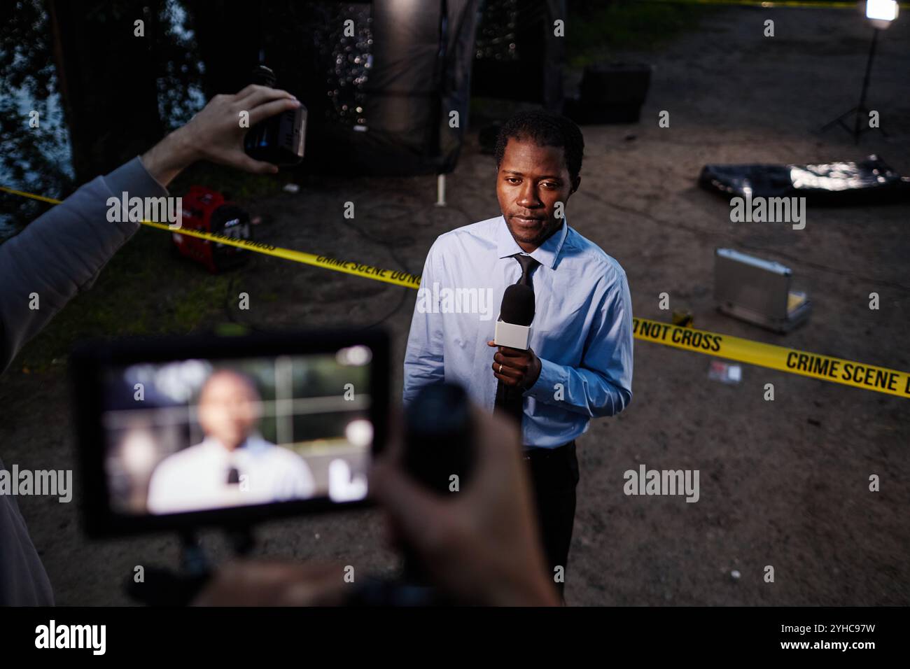 Policeman giving interview reporter outdoors hi-res stock photography ...