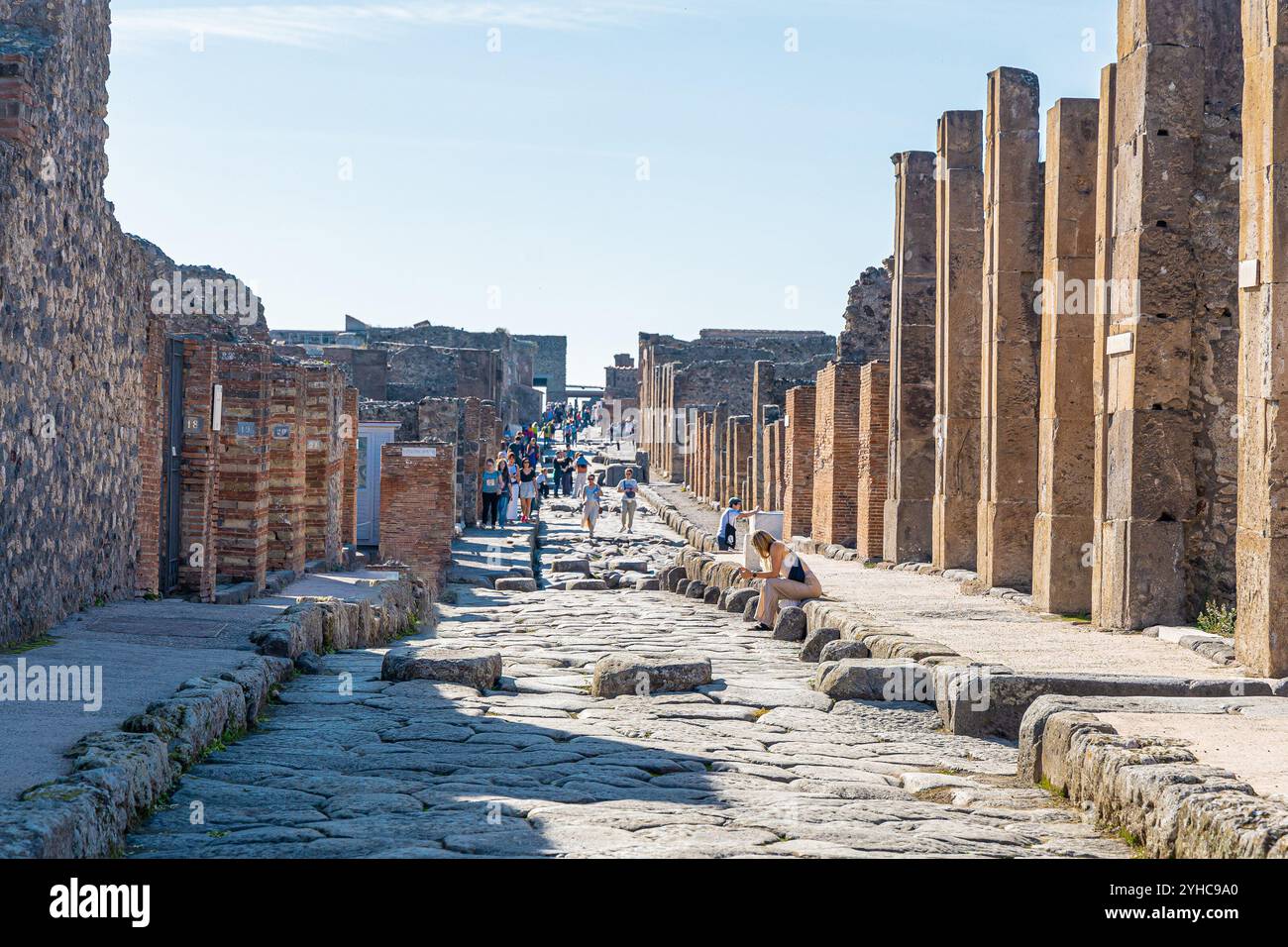 One of many cobblestone roman roads in Pompei archeological site ...