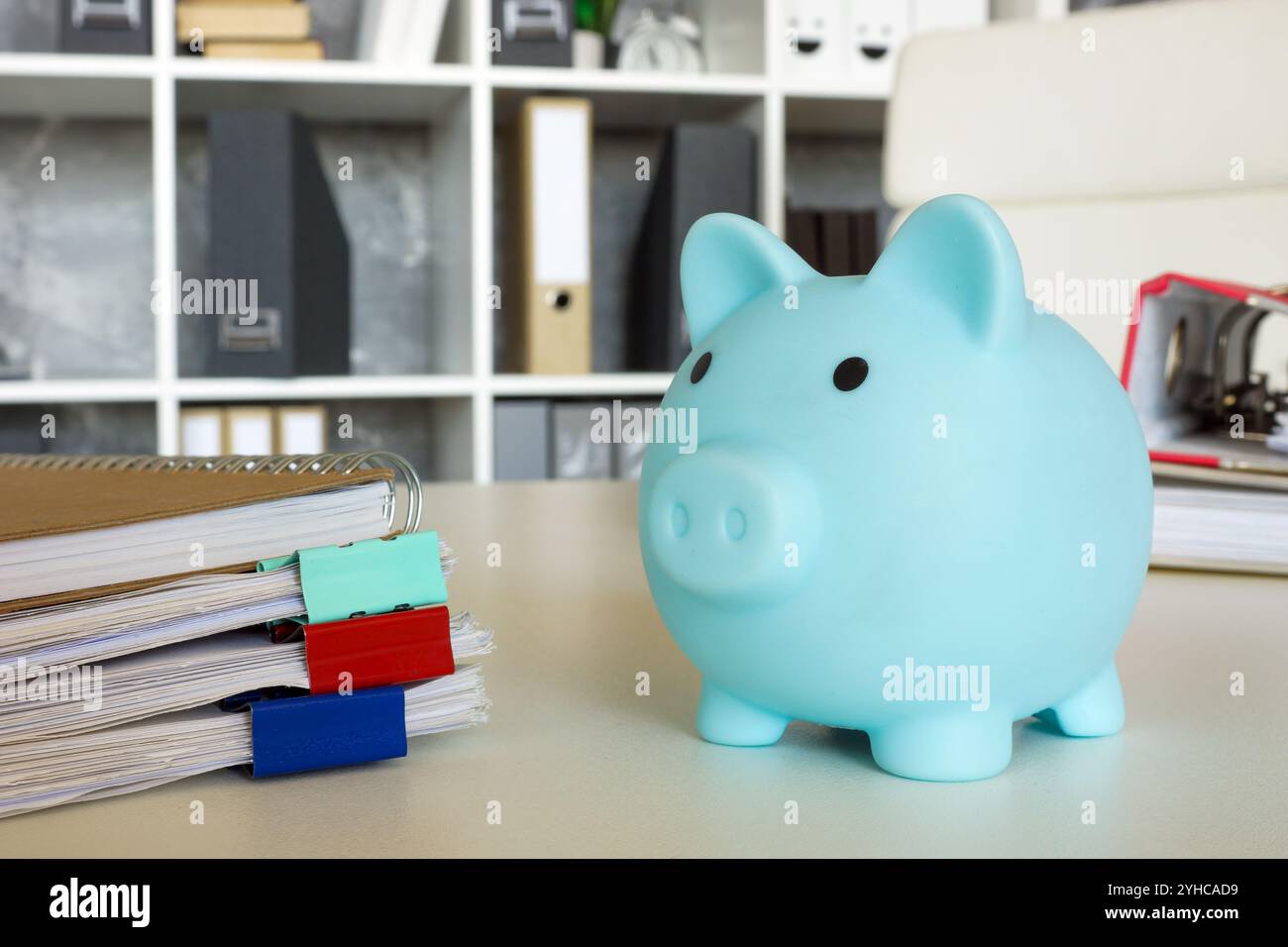 Stack of financial documents and piggy bank. Budget management and ...