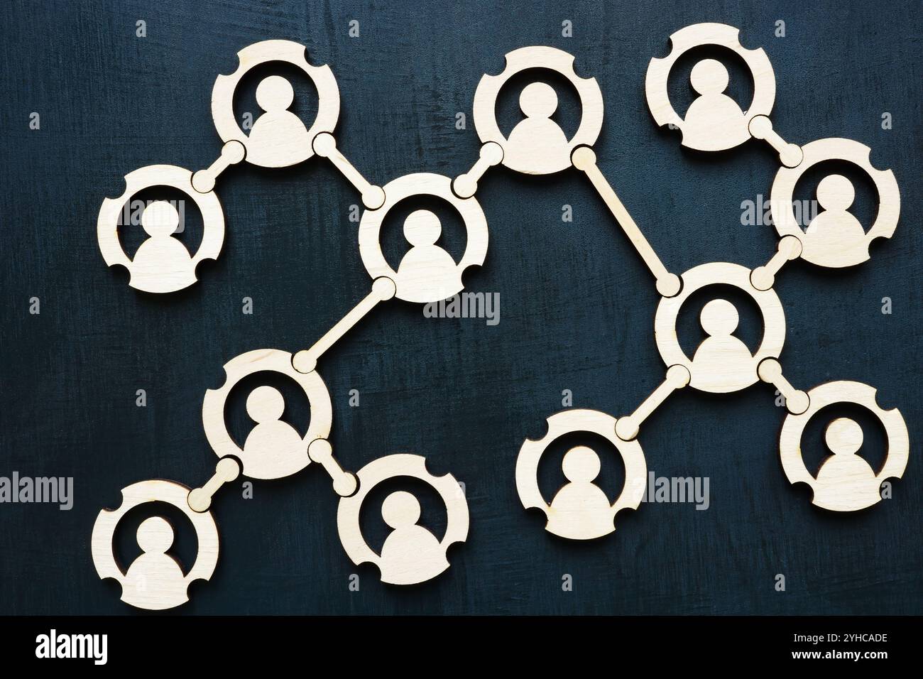 Connected figures. Teamwork and social connection Stock Photo - Alamy