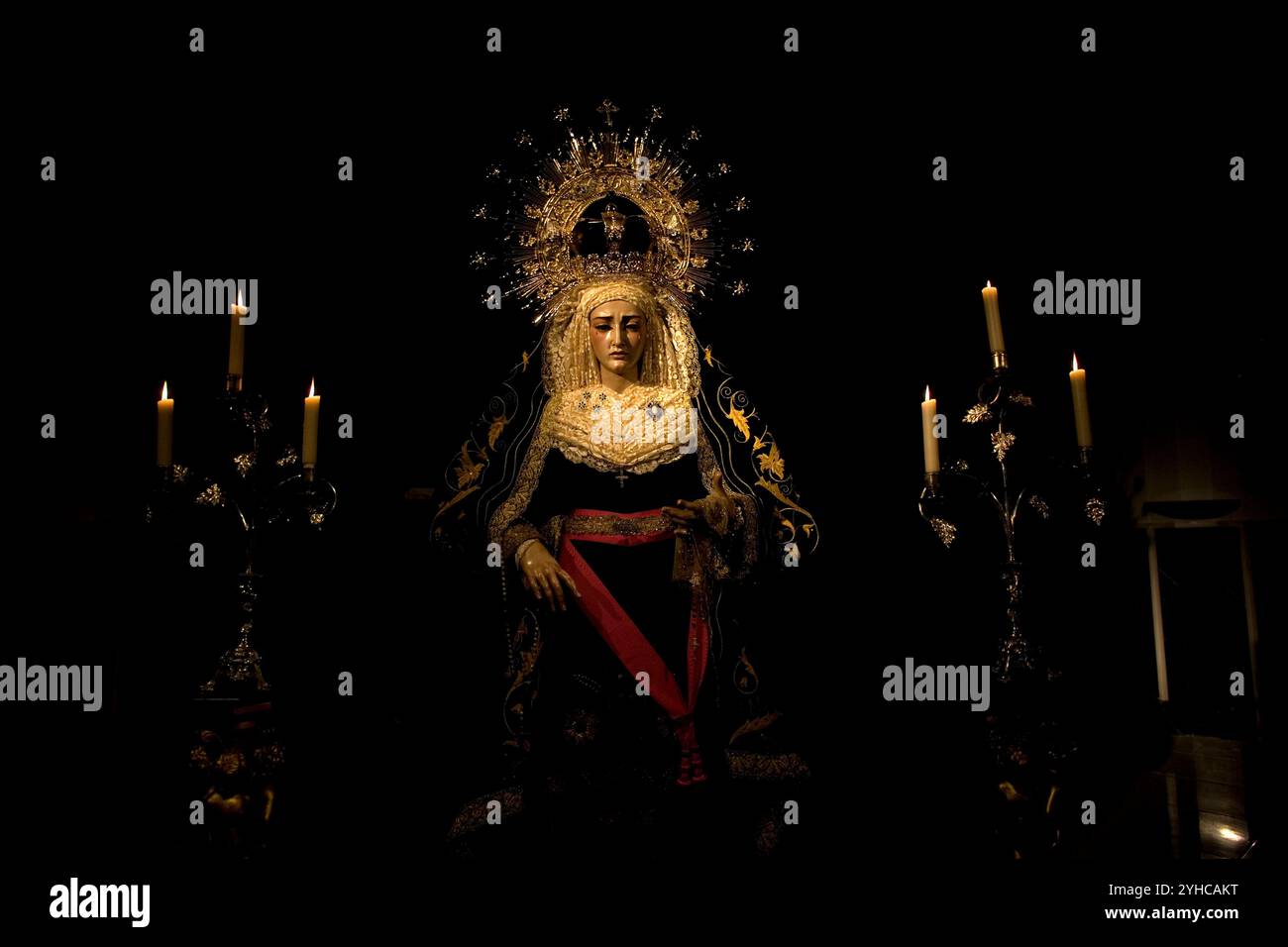 A wooden statue of the Virgin of Pain is publicly displayed before the ...