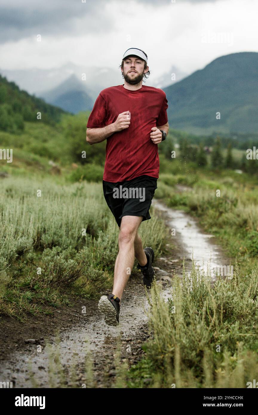 Man running during rain day hi-res stock photography and images - Alamy