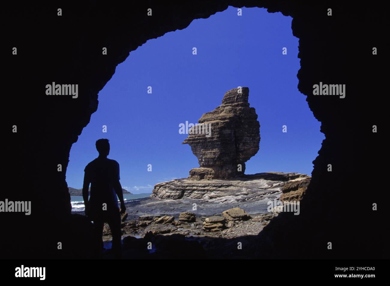 rock cave man silhouette Stock Photo - Alamy