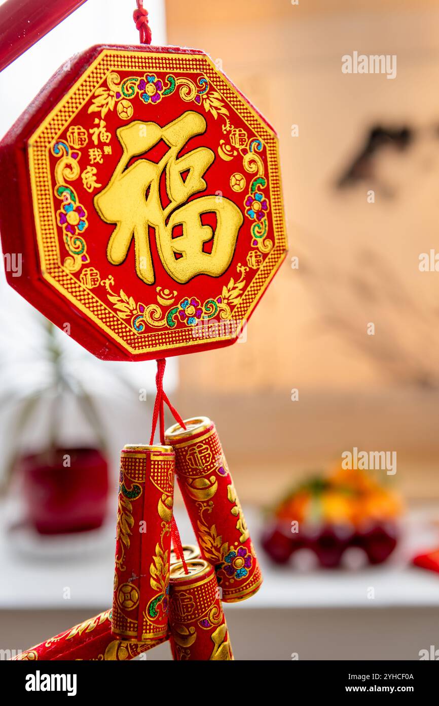 A hanging Chinese New Year decoration with the word fu, good fortune. A ...