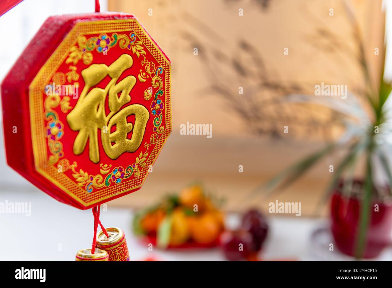 A hanging Chinese New Year decoration with the word fu, good fortune. A ...