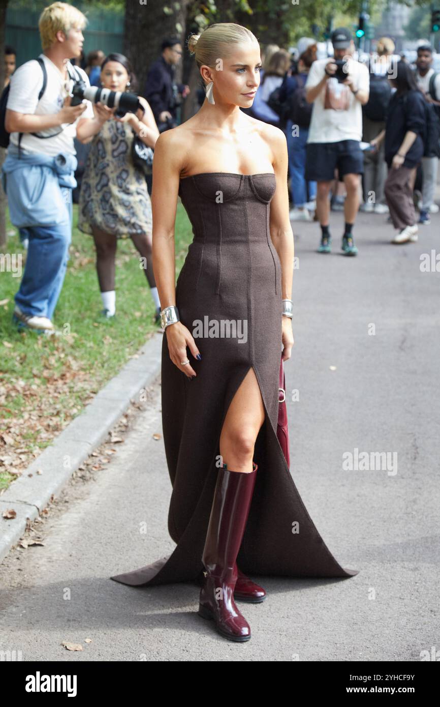 MILAN, ITALY - SEPTEMBER 20, 2024: Caro Daur with brown dress and ...