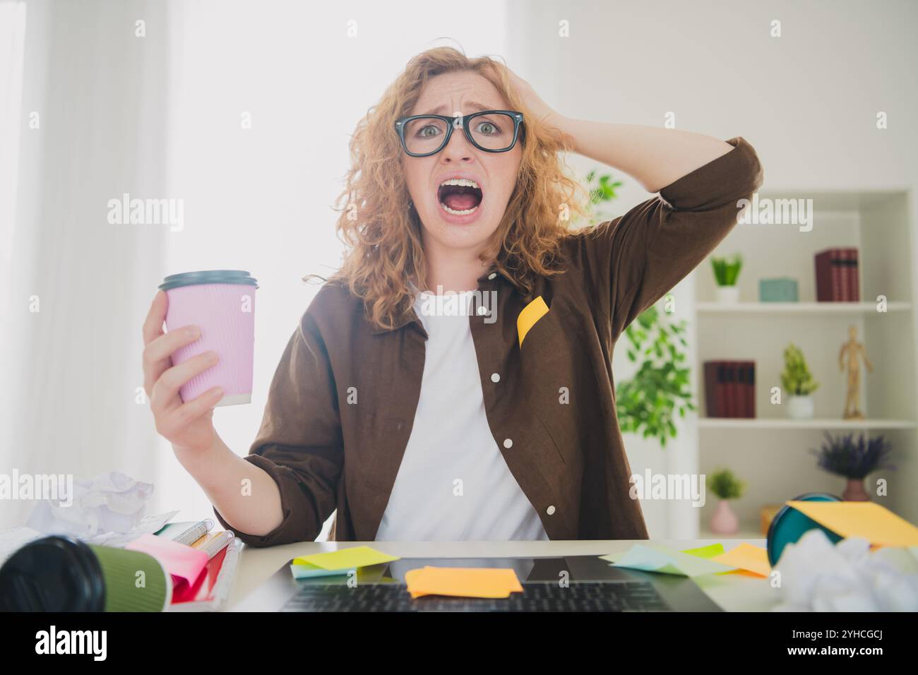 Photo of mad furious stressed depressed busy woman drink espresso sit ...