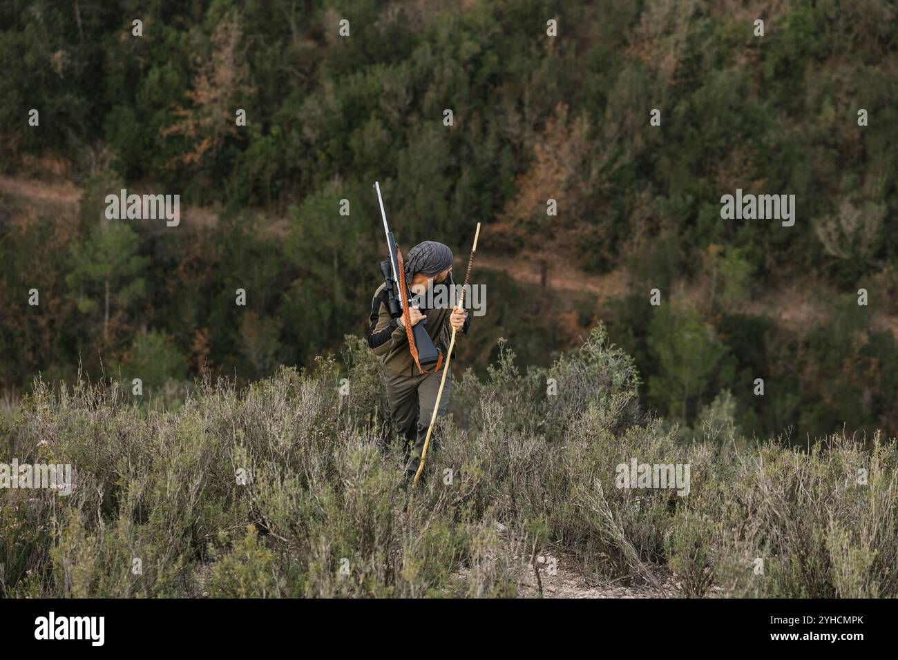 Hunter walking through woods hi-res stock photography and images - Alamy