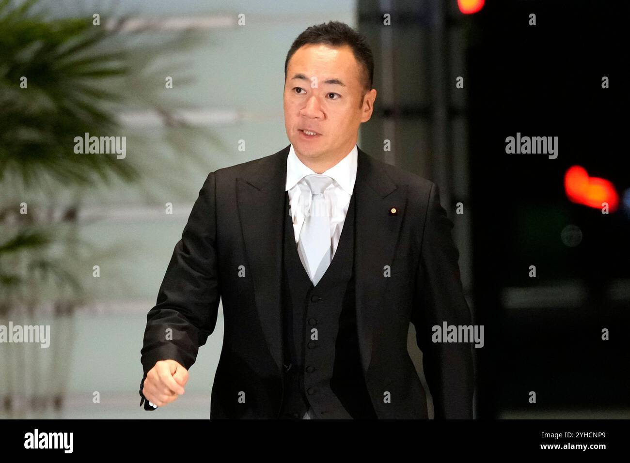 Keisuke Suzuki, newly appointed justice minister, walks at the prime ...