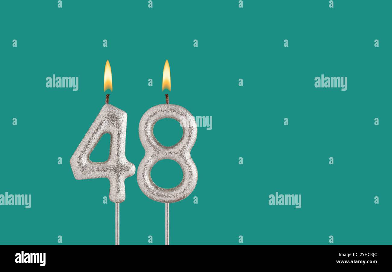 Birthday card on a green background - Candle in the shape of the number ...