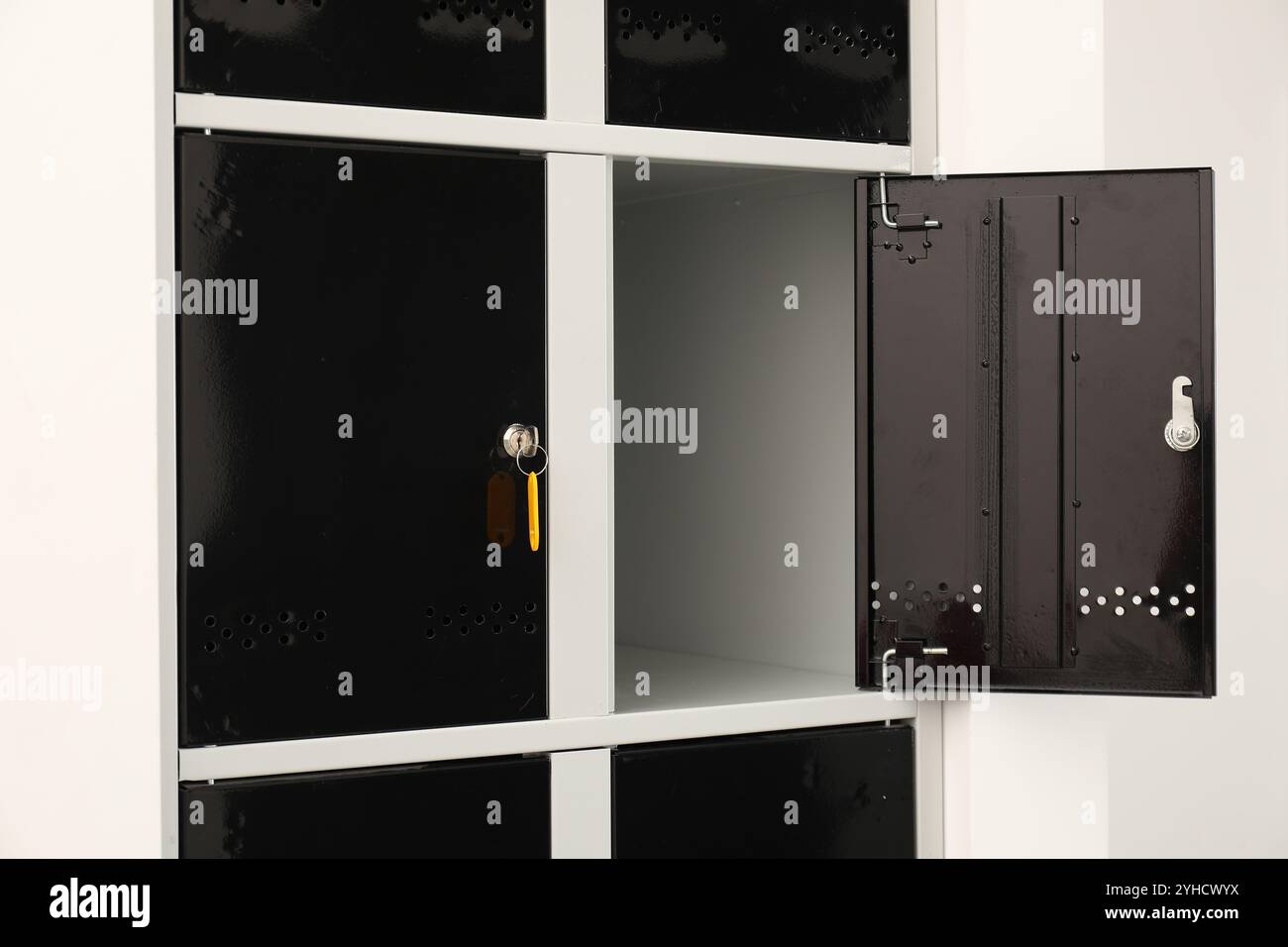 Modern lockers with bright key indoors, closeup Stock Photo - Alamy