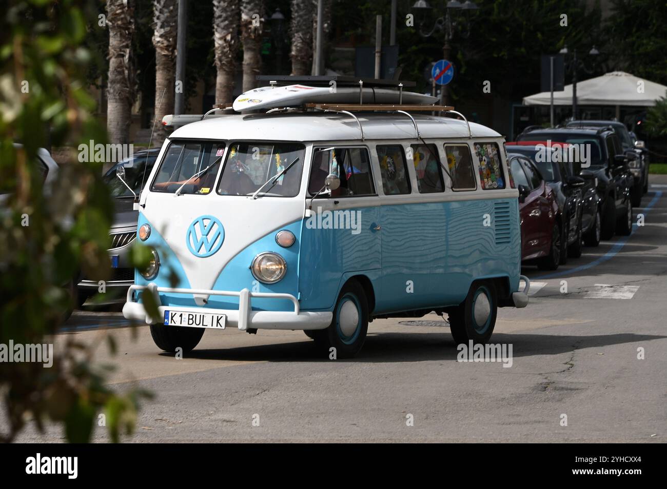 VW Bus T1 with surfboard in Alghero, Sardinia, Italy Stock Photo - Alamy