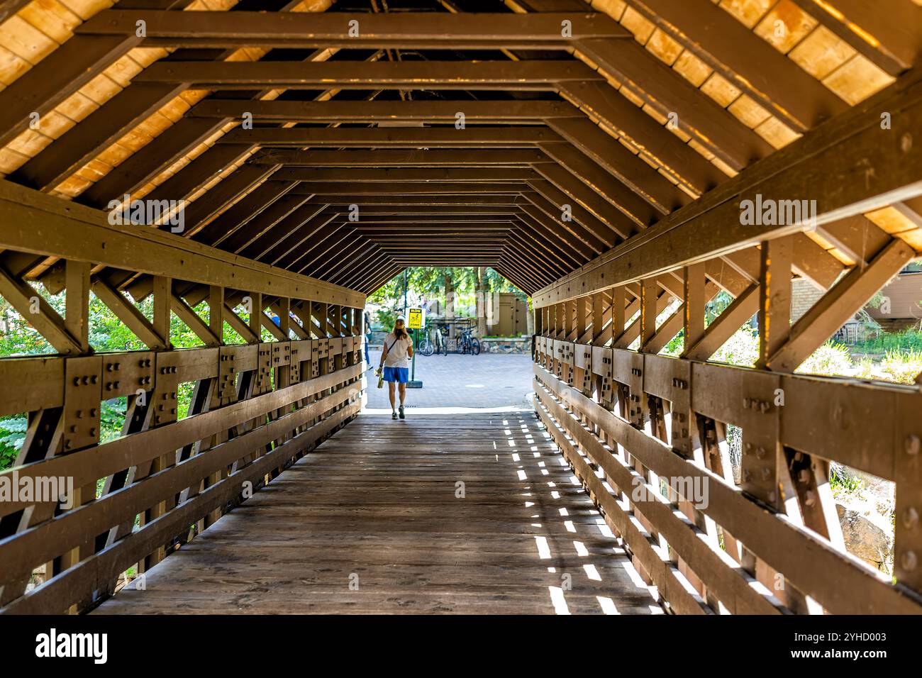 Vail, USA - July 3, 2022: Wooden covered bridge in Colorado over Gore ...
