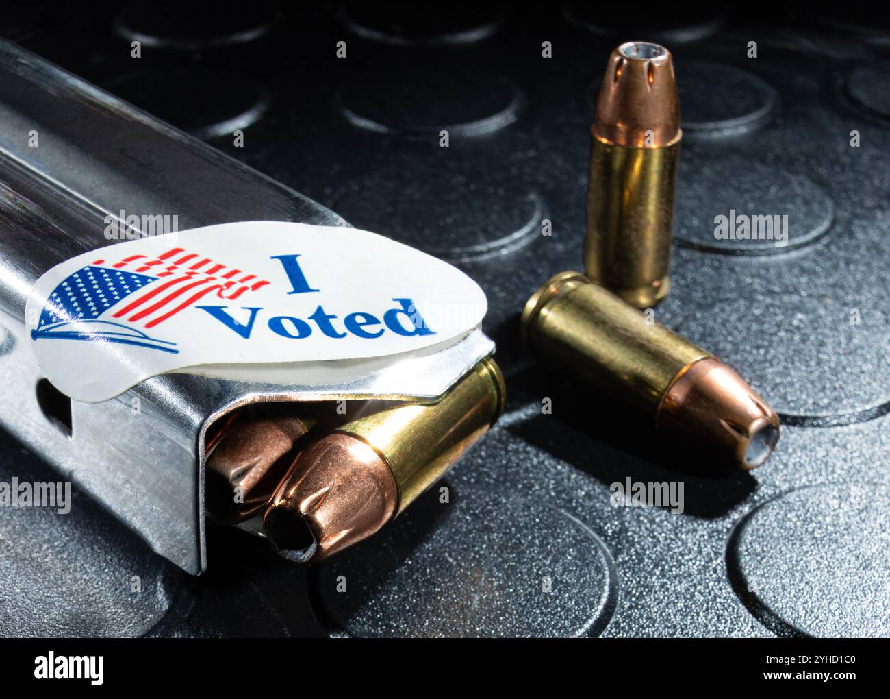 Stainless 9 mm semi-auto pistol magazine loaded with cartridges on a ...