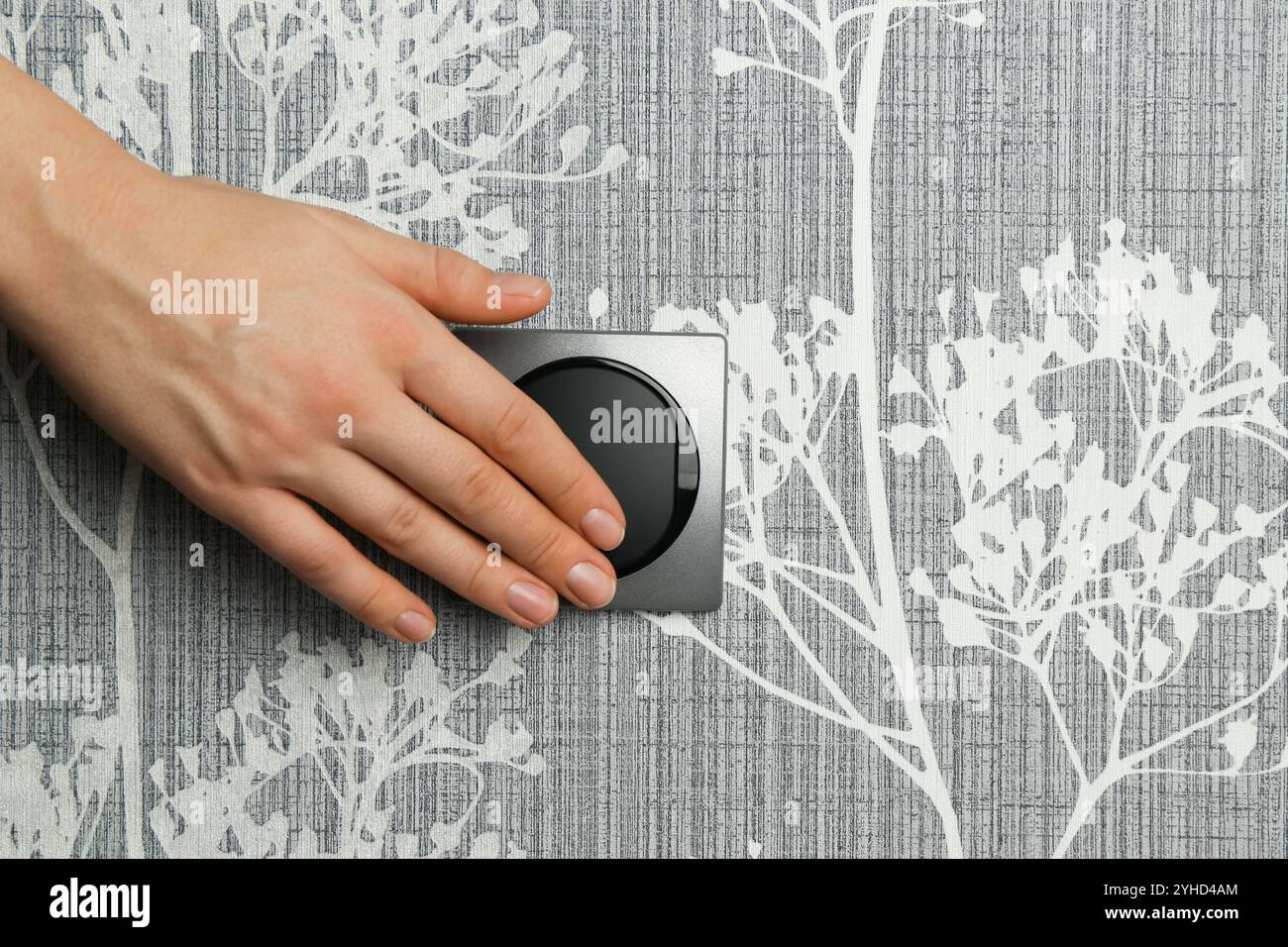 Woman turning light switch on, closeup view Stock Photo - Alamy