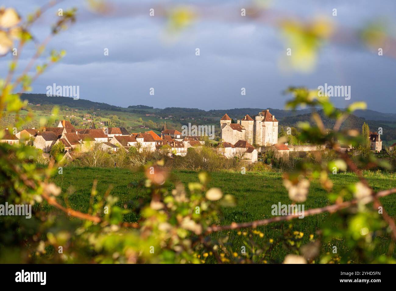 View over the medieval town of Curemonte after rain with a rainbow ...