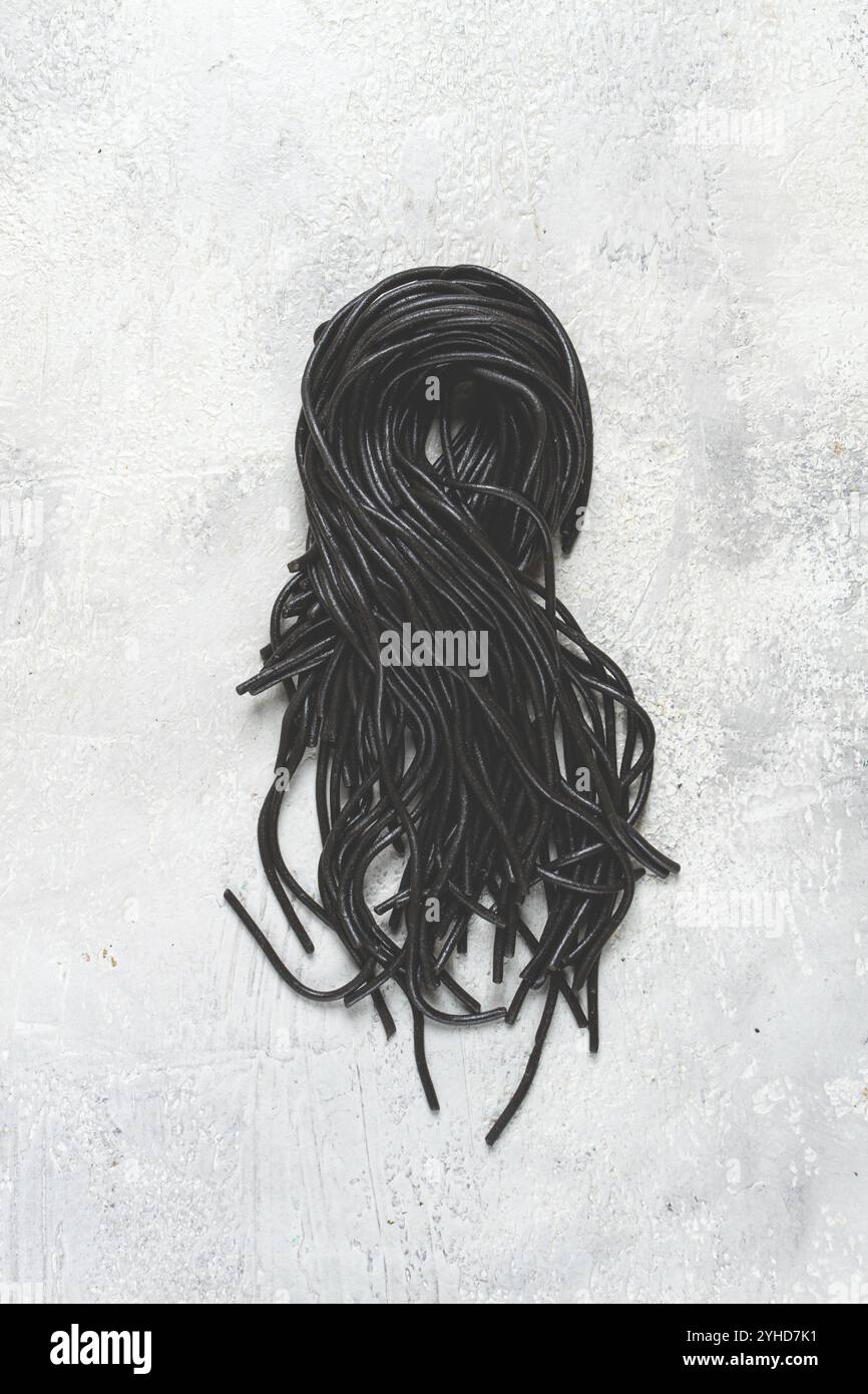 Black spaghetti, black pasta on the table, spaghetti nori, raw, food ...