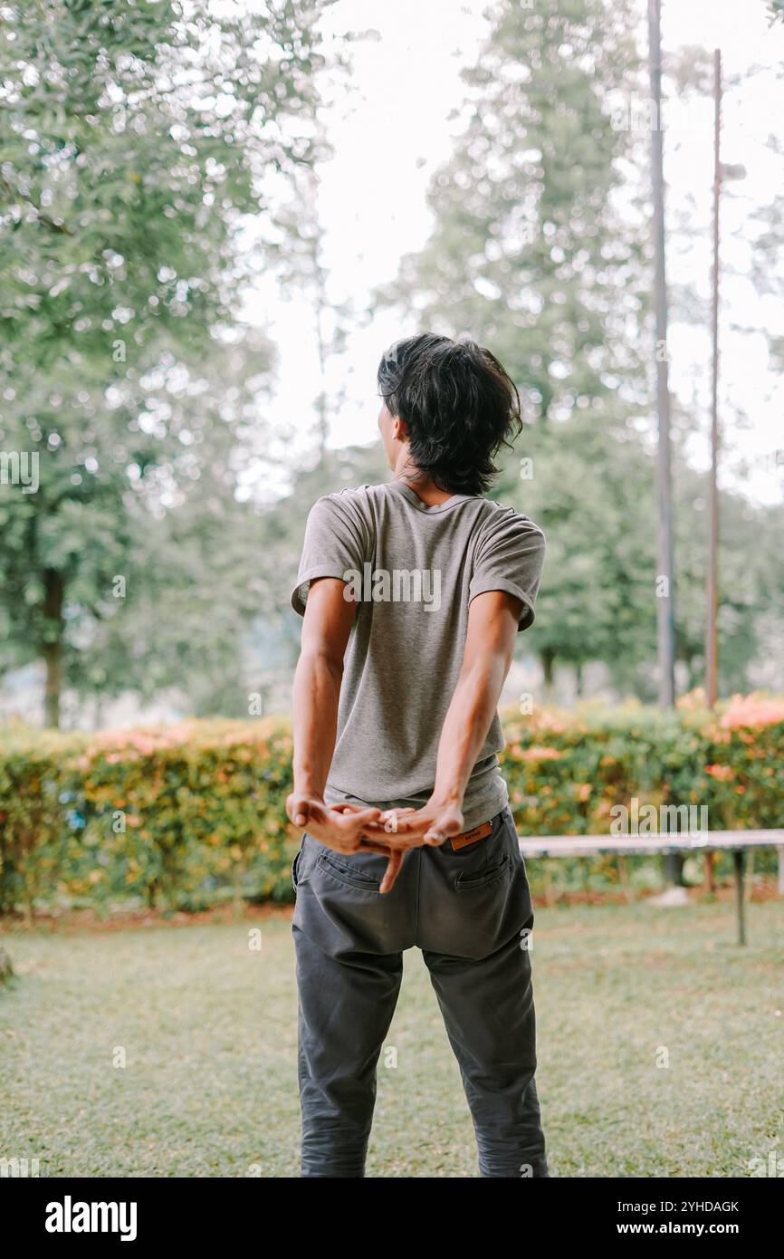 Back view young asian handsome hi-res stock photography and images - Alamy