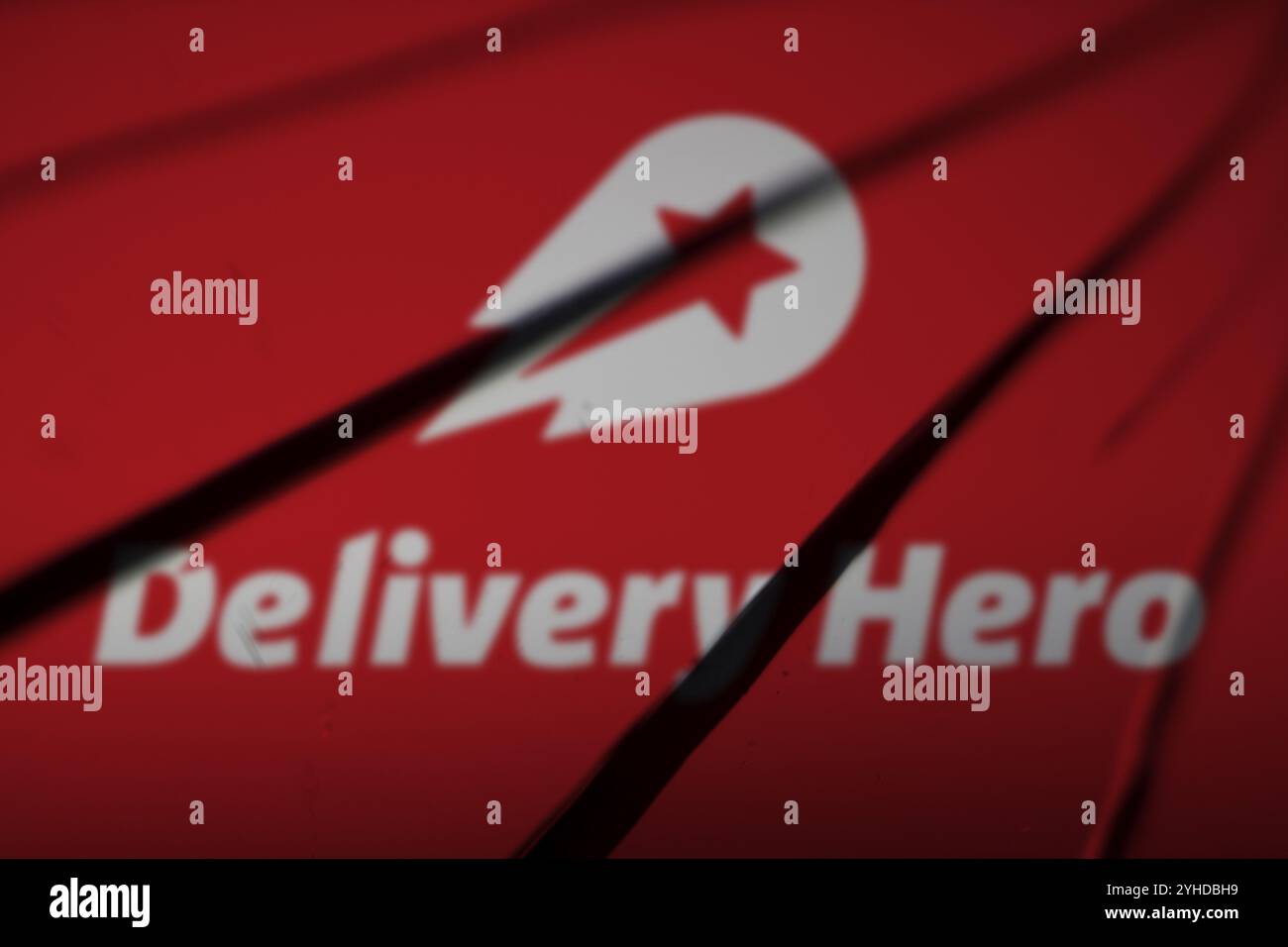 Delivery hero logo is visible on the broken glass hi-res stock photography and images - Alamy