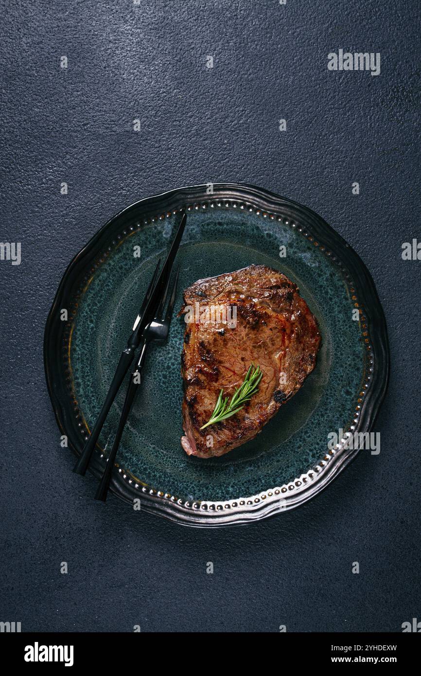 Grilled steak, beef steak, rib eye steak, on a plate, top view, no ...