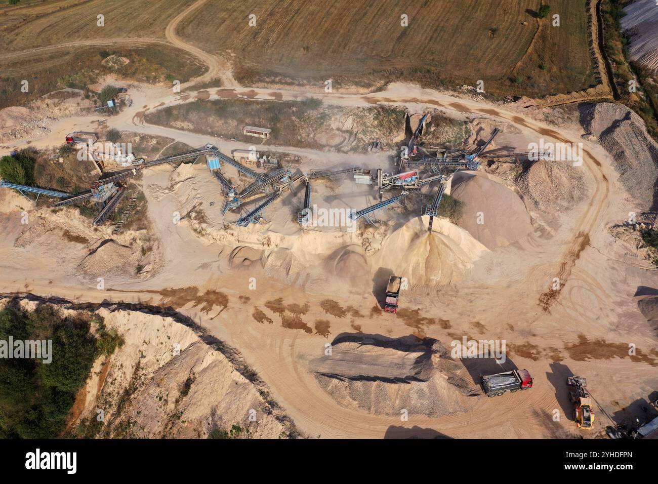 Gravel quarry crushing machine hi-res stock photography and images - Alamy