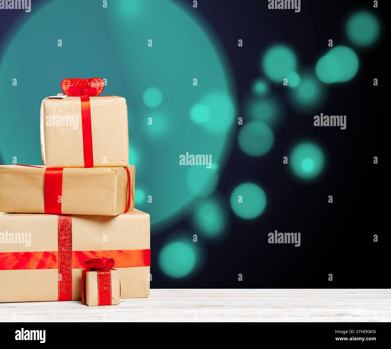 pile of gifts on the old table Stock Photo - Alamy