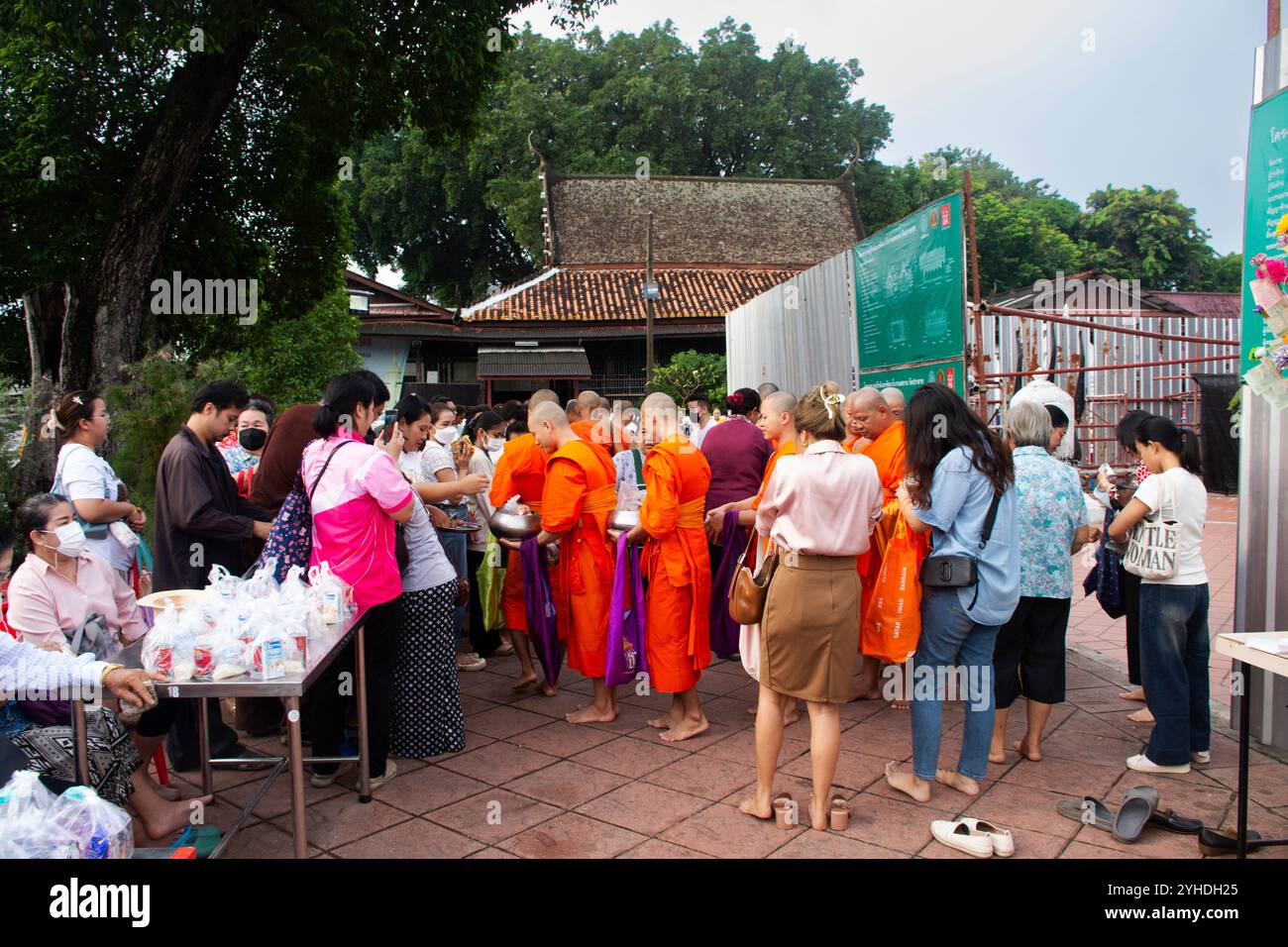 Thai people join rite ritual Tak Bat Devo Buddhism festival and give ...
