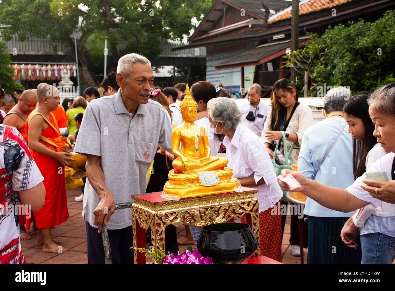 Thai people join rite ritual Tak Bat Devo Buddhism festival and give ...