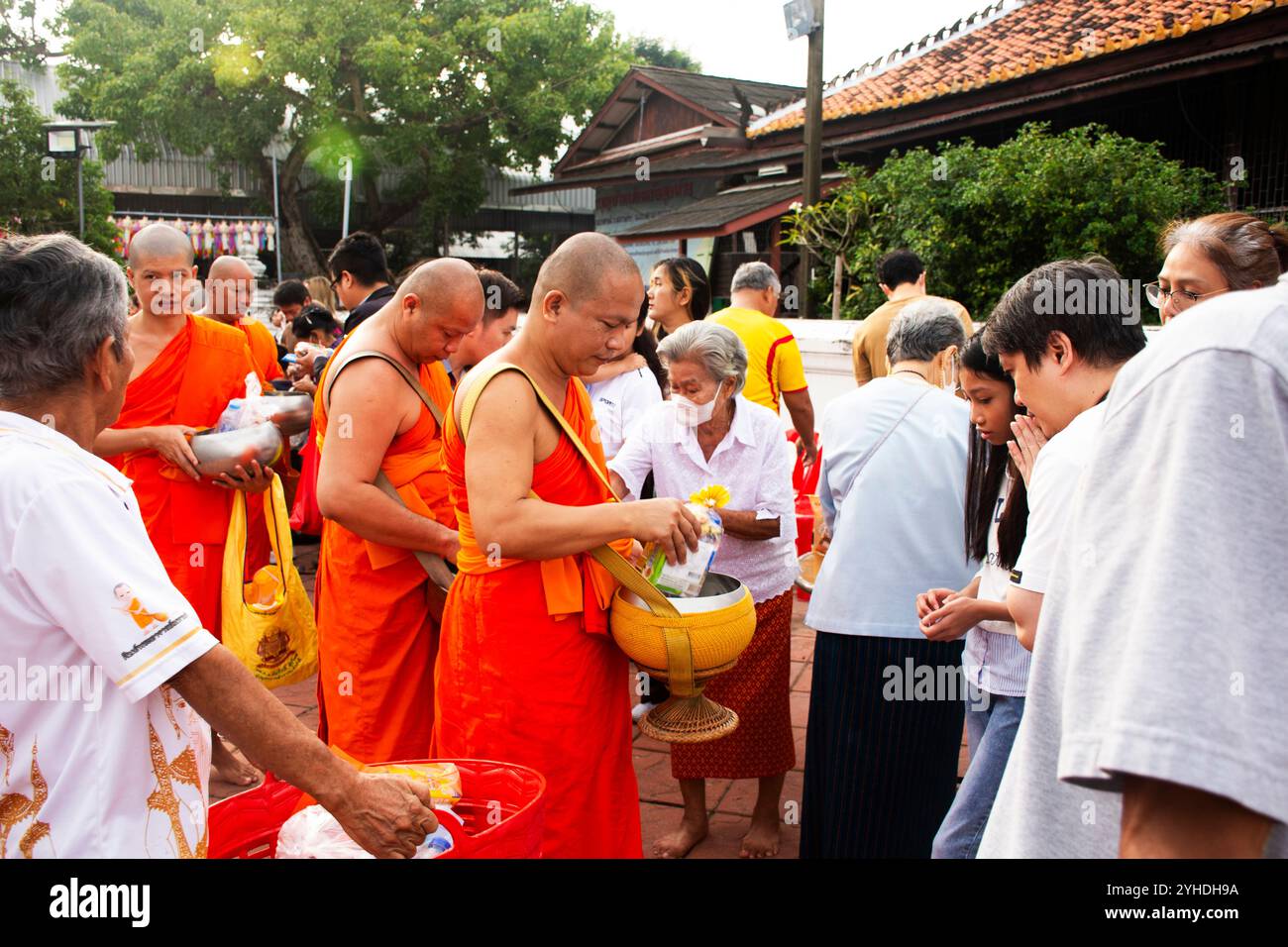 Thai people join rite ritual Tak Bat Devo Buddhism festival and give ...
