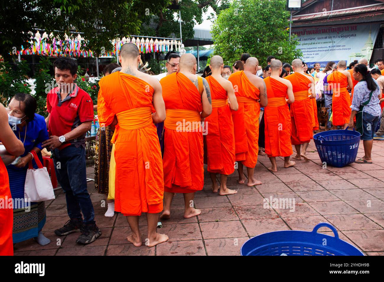 Thai people join rite ritual Tak Bat Devo Buddhism festival and give ...