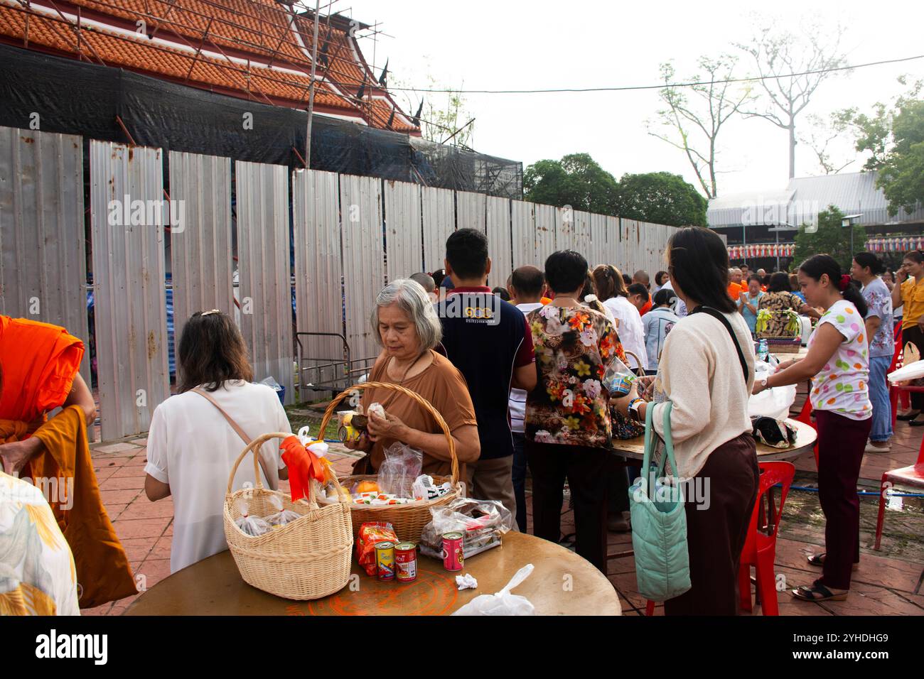 Thai people join rite ritual Tak Bat Devo Buddhism festival and give ...
