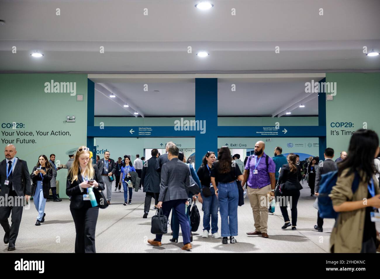 Baku, Azerbaijan. 11th Nov, 2024. Participants crowd in a hall during ...