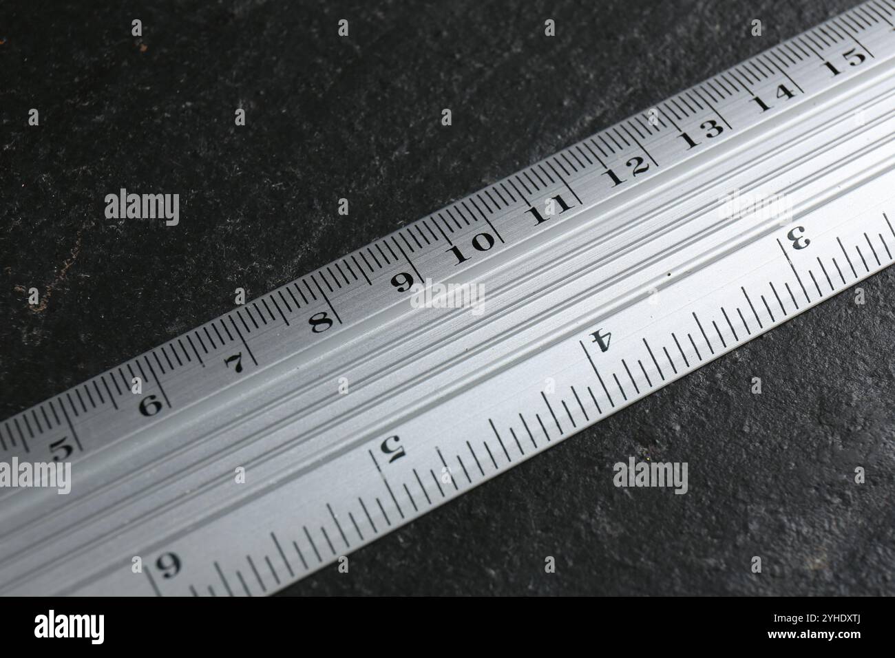 Metal ruler on black hi-res stock photography and images - Alamy