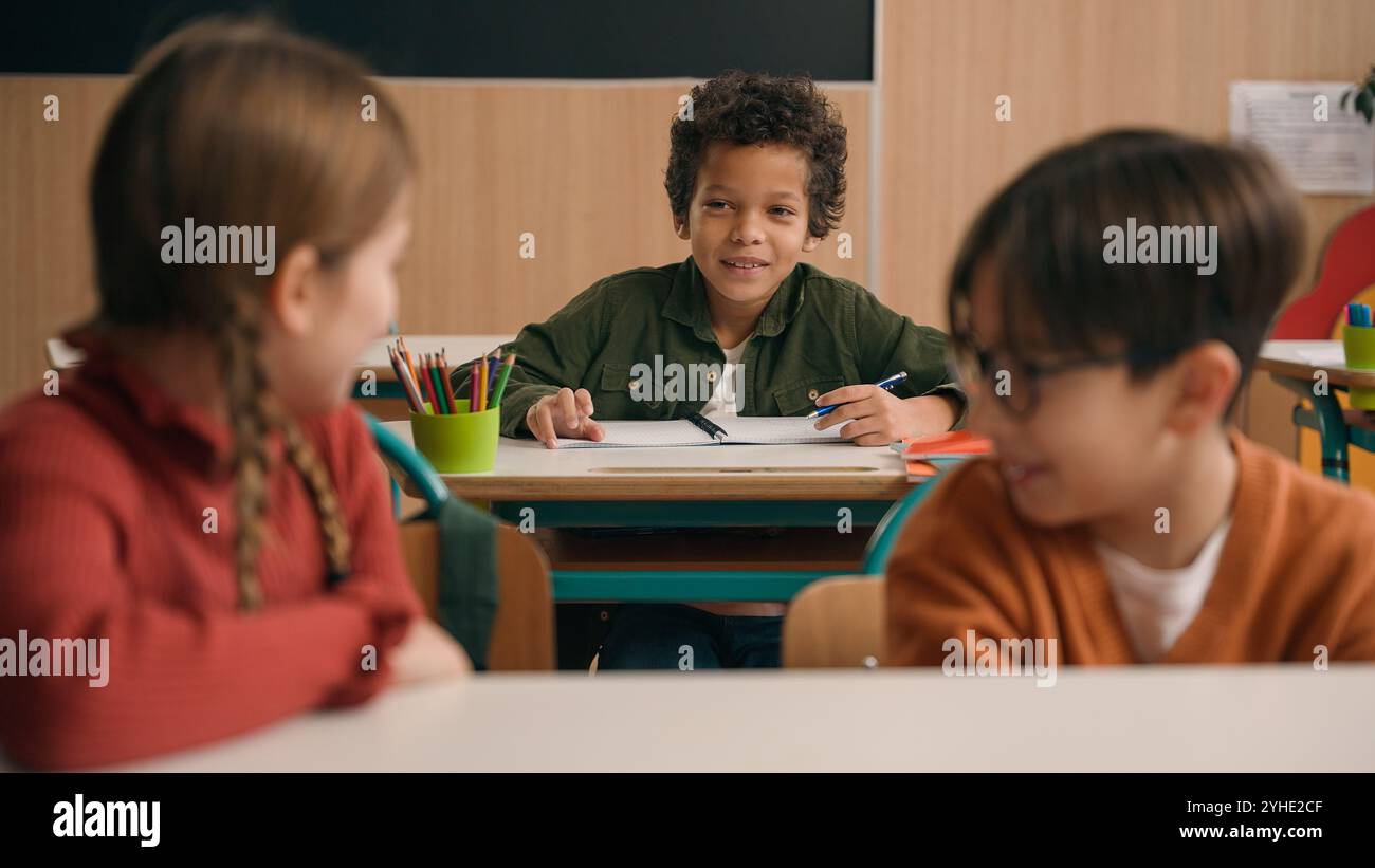 Multiracial diverse noisy little classmates multiethnic students pupils ...