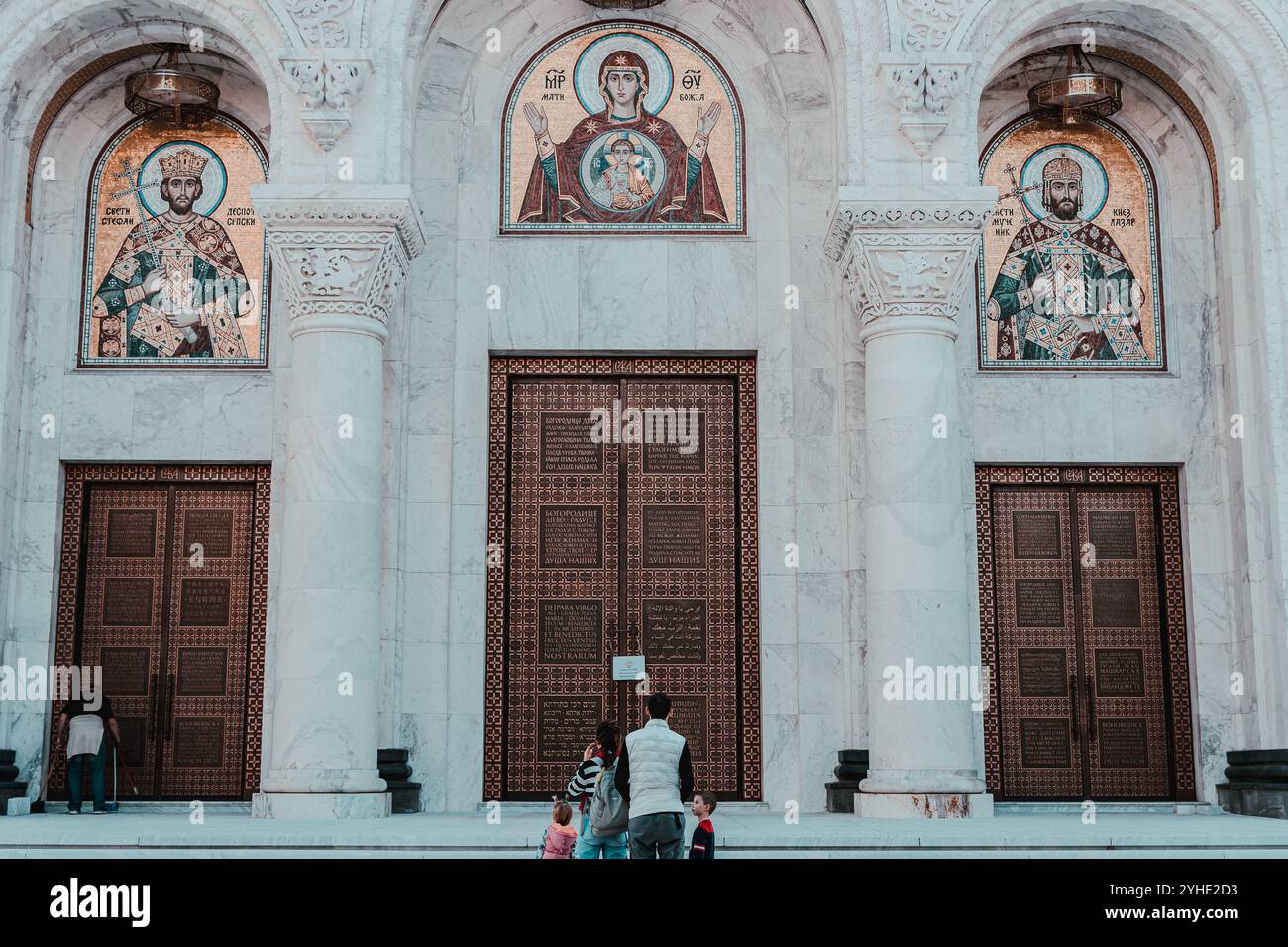 Belgrade, Serbia- 10162024: The Temple Of Saint Sava indoor interior, people pray in an Orthodox ...