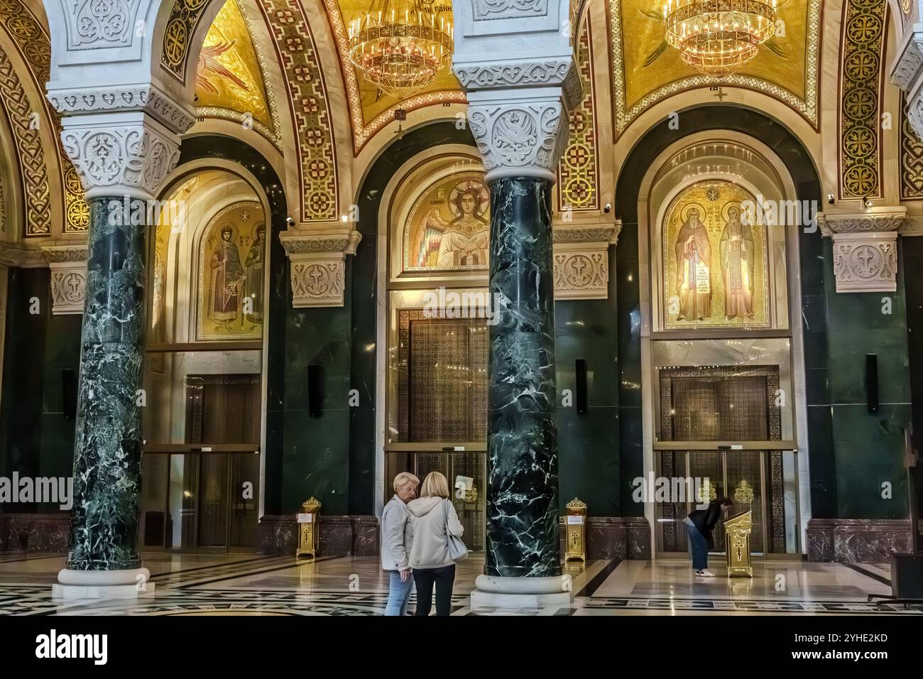Belgrade, Serbia- 10162024: The Temple Of Saint Sava indoor interior, people pray in an Orthodox ...