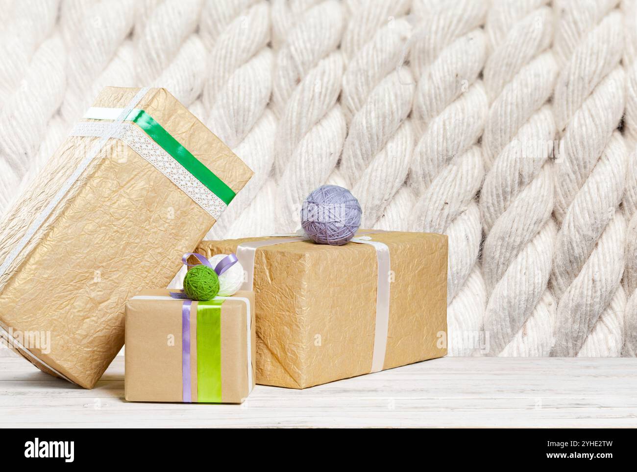 pile of gifts on the old table Stock Photo - Alamy