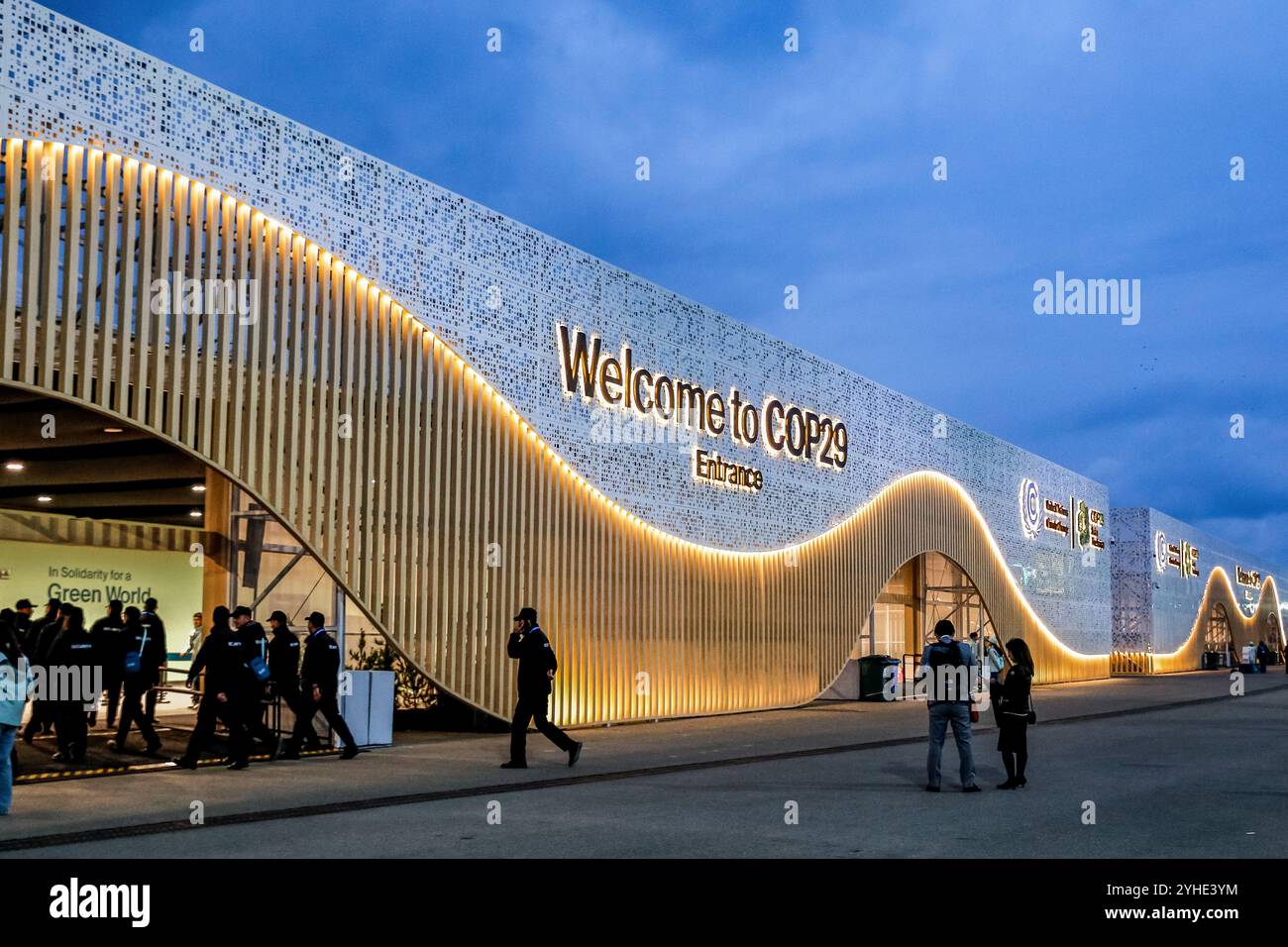 Baku, Azerbaijan. 11th Nov, 2024. Participants walk by the entrance of ...