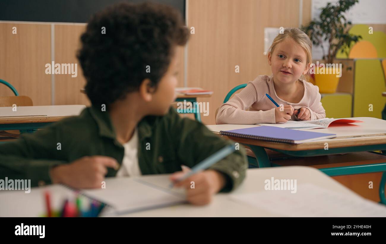 Multiracial diverse little classmates multiethnic students pupils two ...